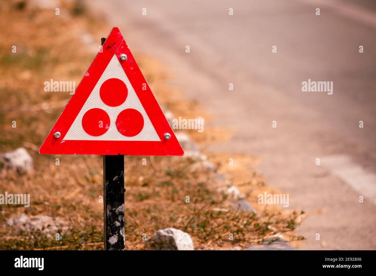 Cautionary Sign indicating start of median cub along the road. Divider ...