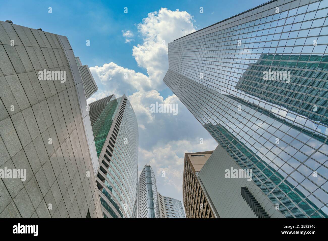 Financial district in modern city with skyscraper and office building ...