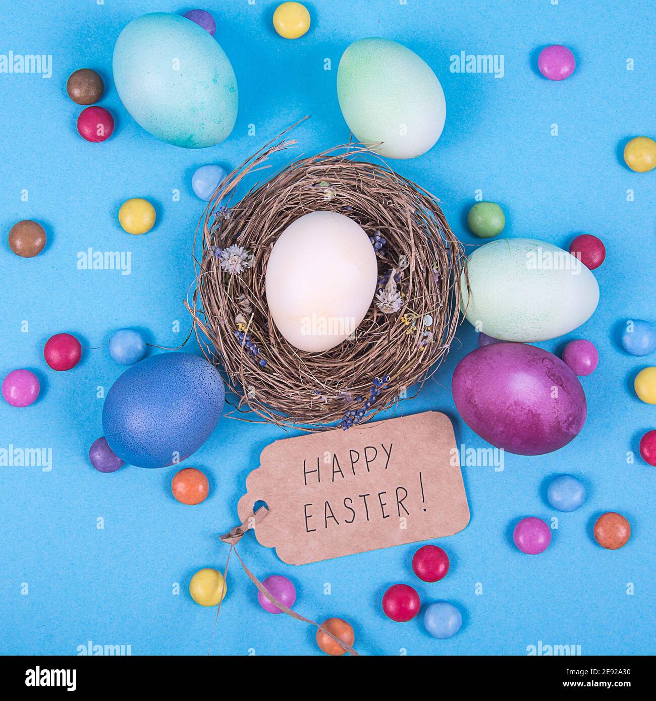 Colorful background with Easter eggs on blue background. Happy Easter ...