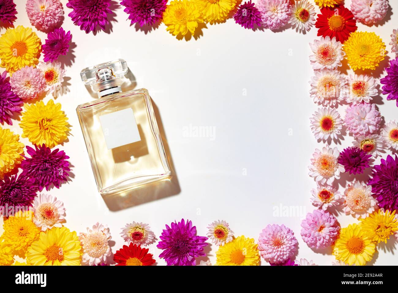 Bottle fragrance surrounded flower hi-res stock photography and images ...