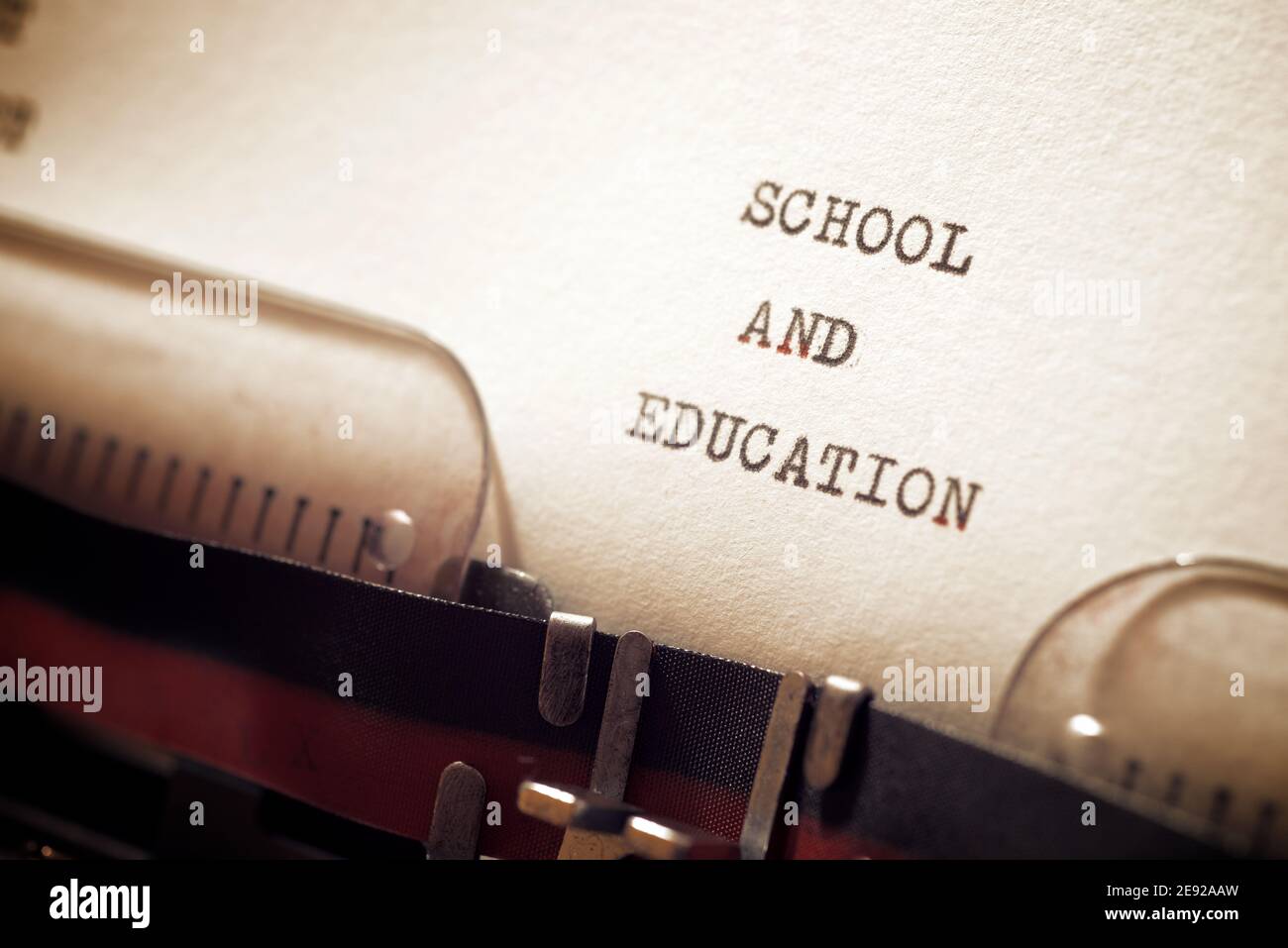 School and education phrase written with a typewriter Stock Photo - Alamy