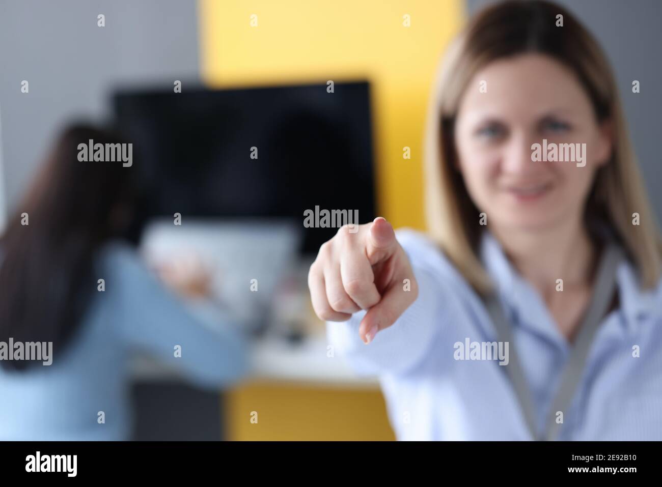 Female manager pointing forefinger forward in office closeup Stock ...