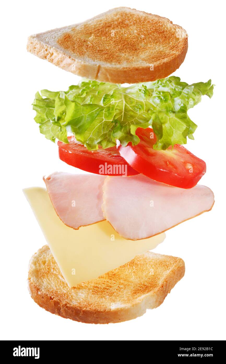 Flying ingredients for sandwich with bacon and vegetables isolated on ...