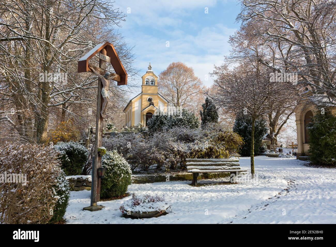 Scenic winter landscape with trees, Jesus Christ on the cross and a ...