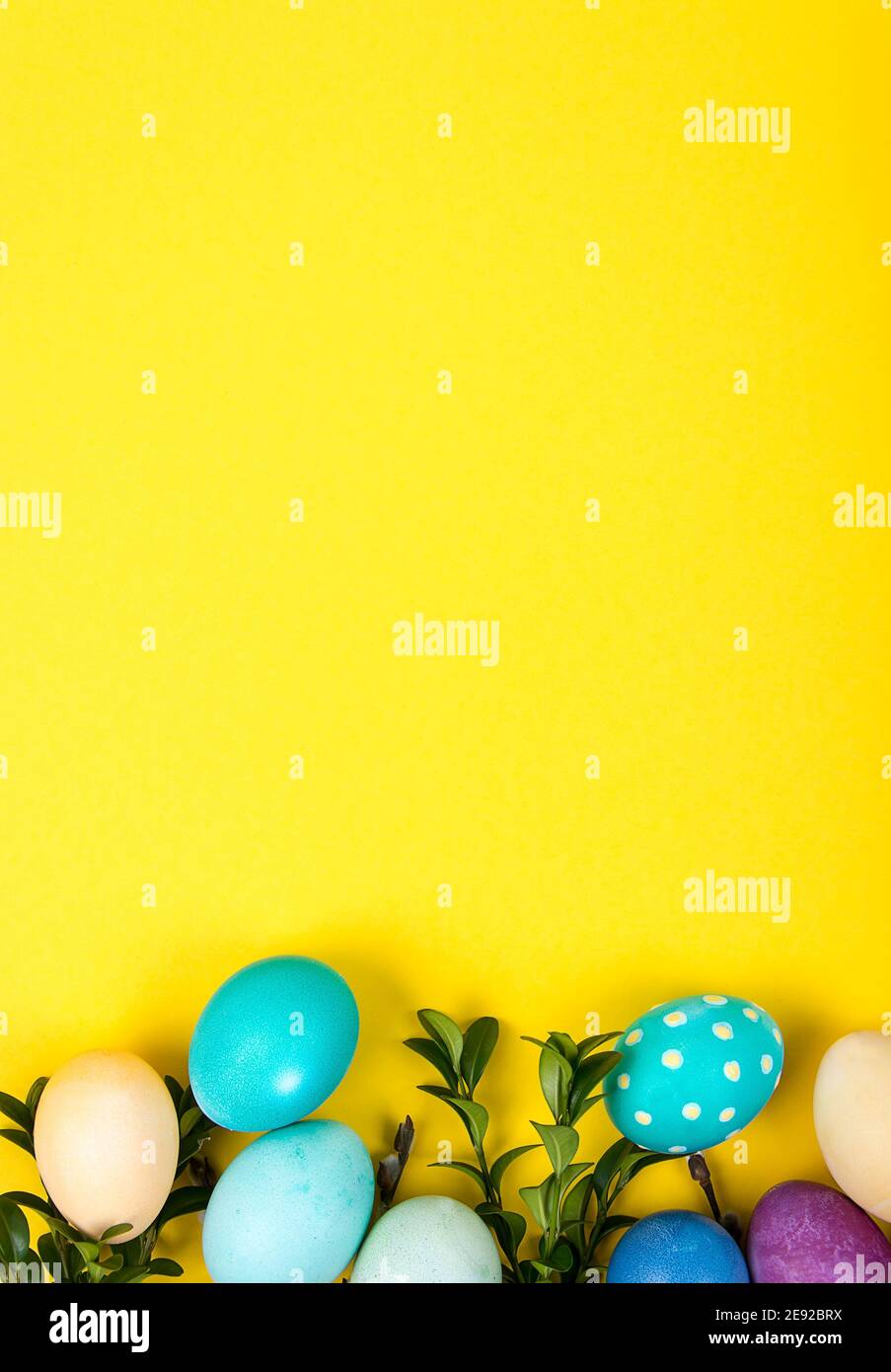 Colorful background with Easter eggs on yellow background. Happy Easter ...