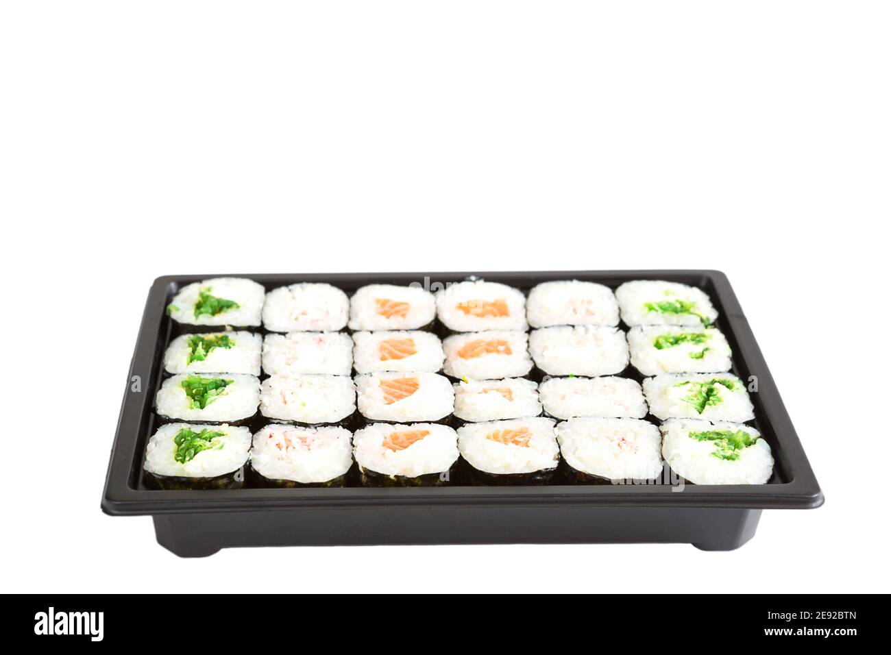 Sushi and rolls in a shipping container. Delivery of Japanese cuisine ...