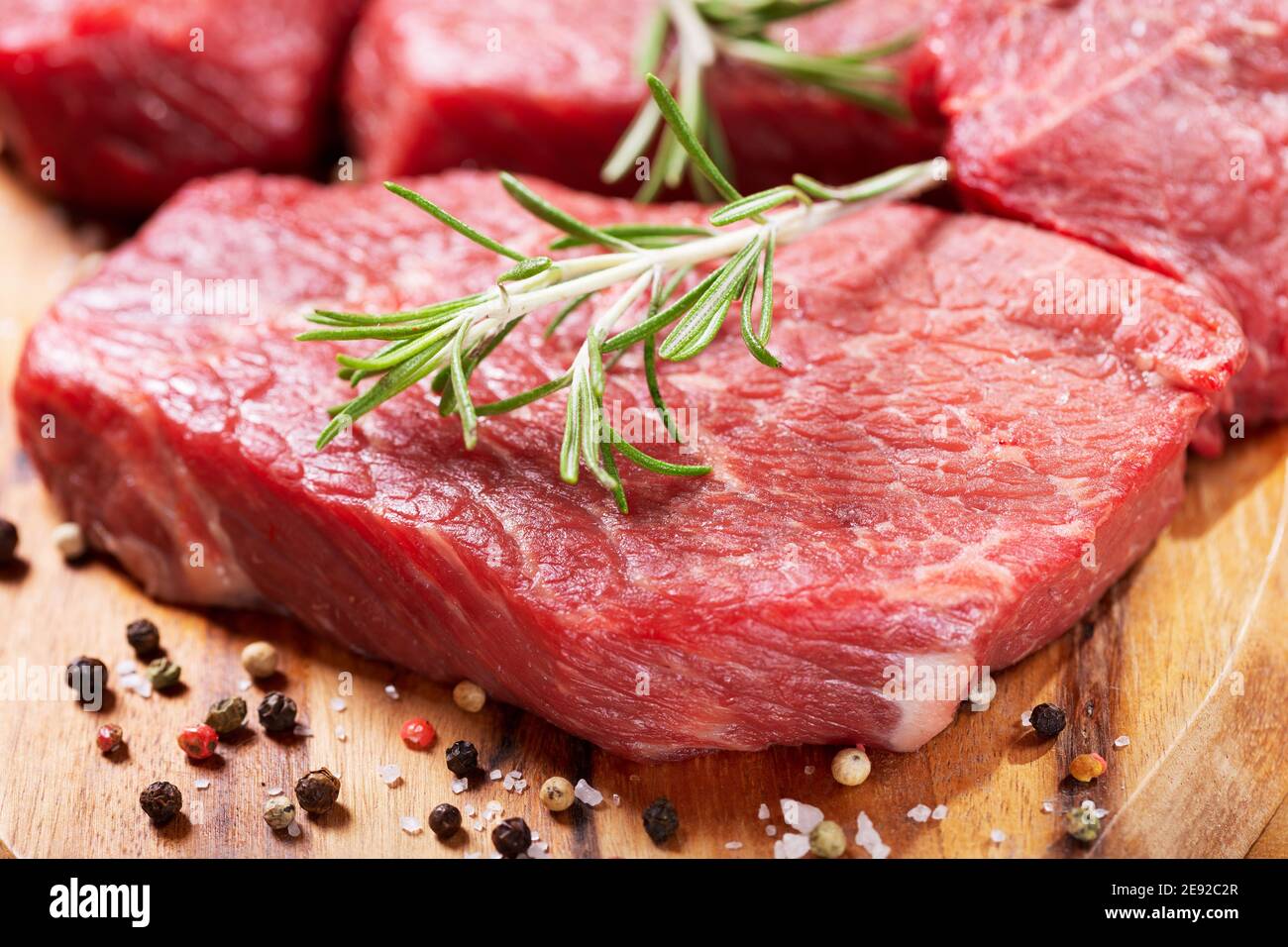fresh meat with ingredients for cooking on wooden table Stock Photo - Alamy