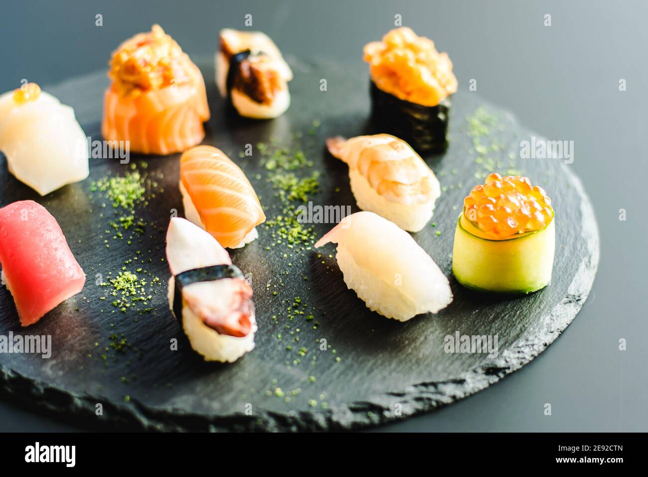 Maki and nigiri sushi variety with salmon, shrimp, avocado and tuna at ...