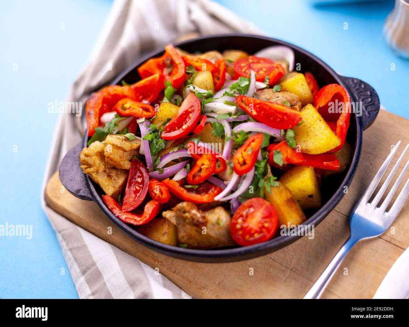 Pork ojakhuri with vegetables. Meat, potatoes, onions, herbs, peppers ...