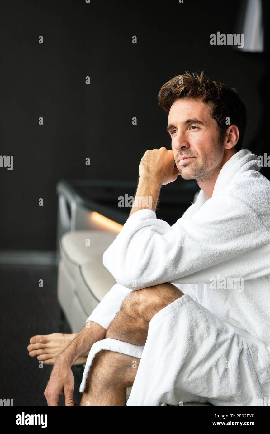 Handsome man in white robe hi-res stock photography and images - Alamy