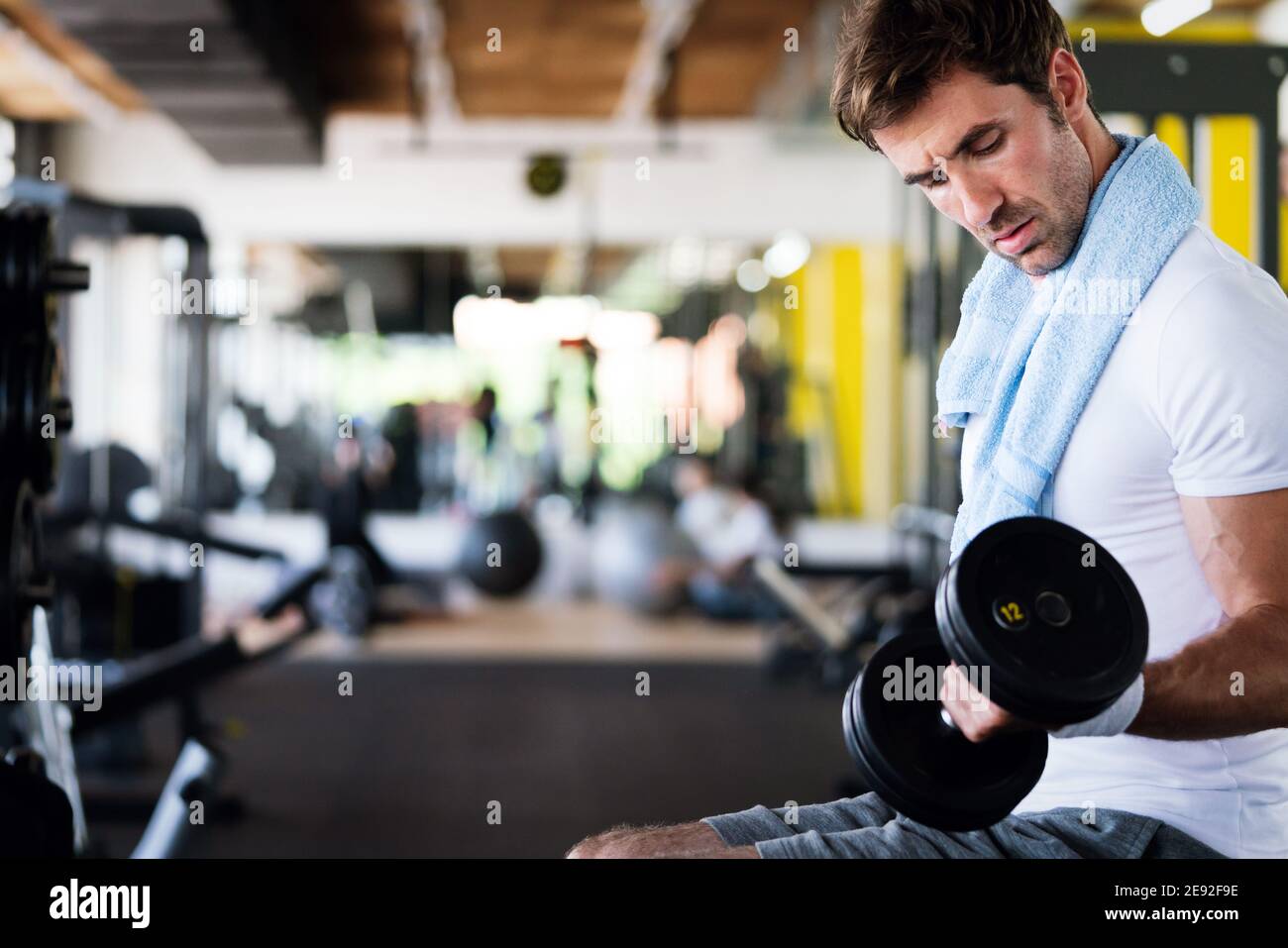 Young determined athlete lifting hi-res stock photography and images ...