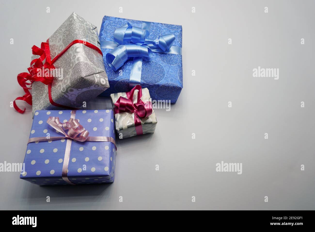 Boxes of presents and gifs of different shapes sizes and colours Stock ...