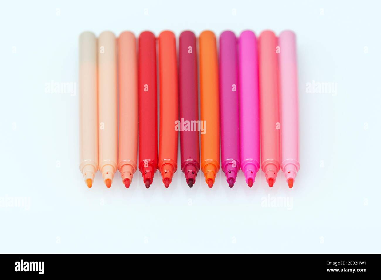 Set of red colored marker pens on white background. Different shades of ...