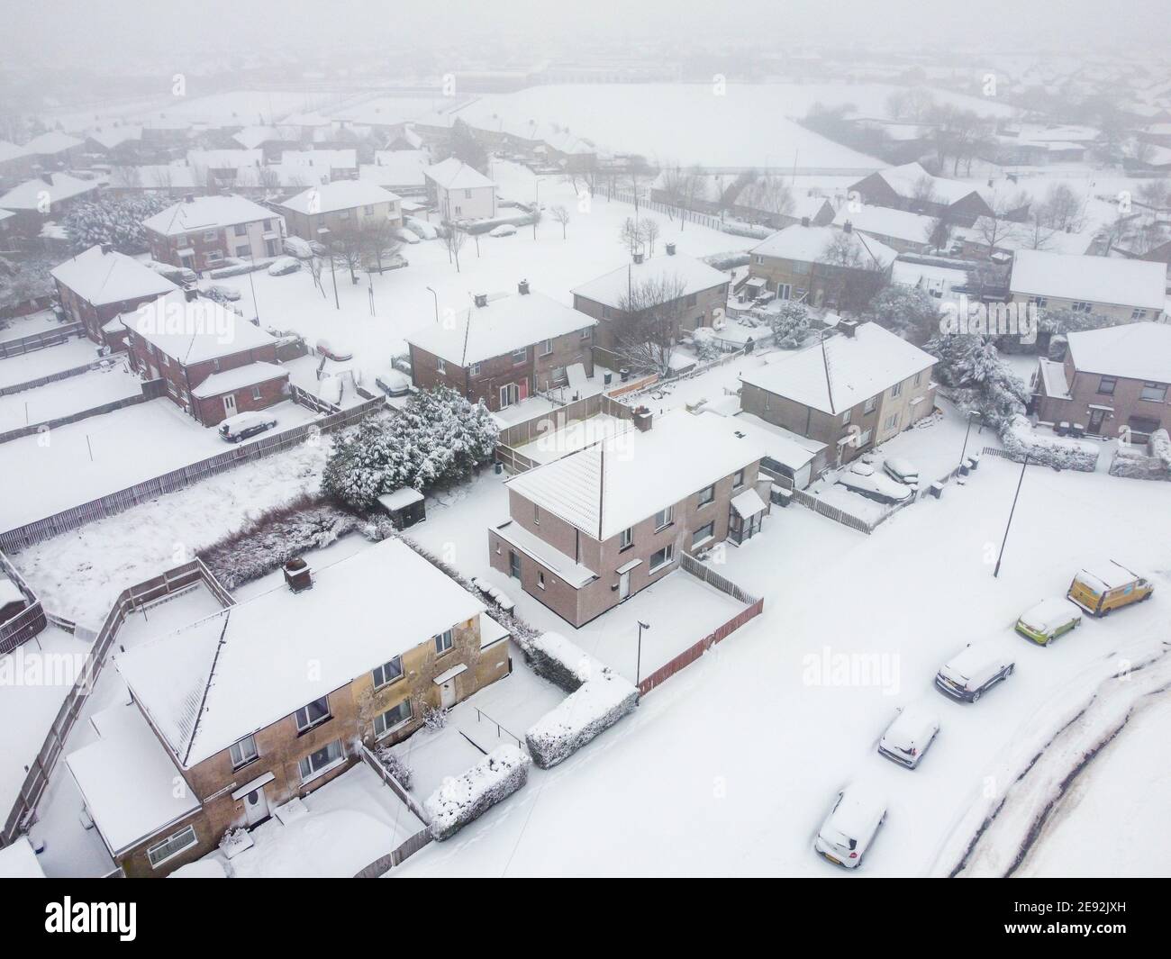 Aerial view of snow-covered streets in Bradford, West Yorkshire, UK ...