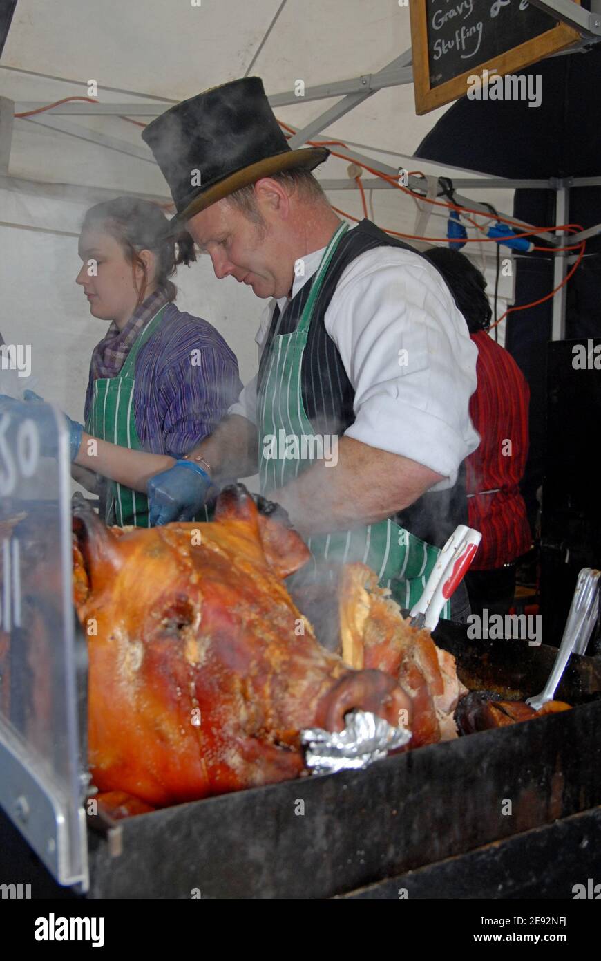 A Butcher serves hog roast to visitors at the Worcester Victorian ...