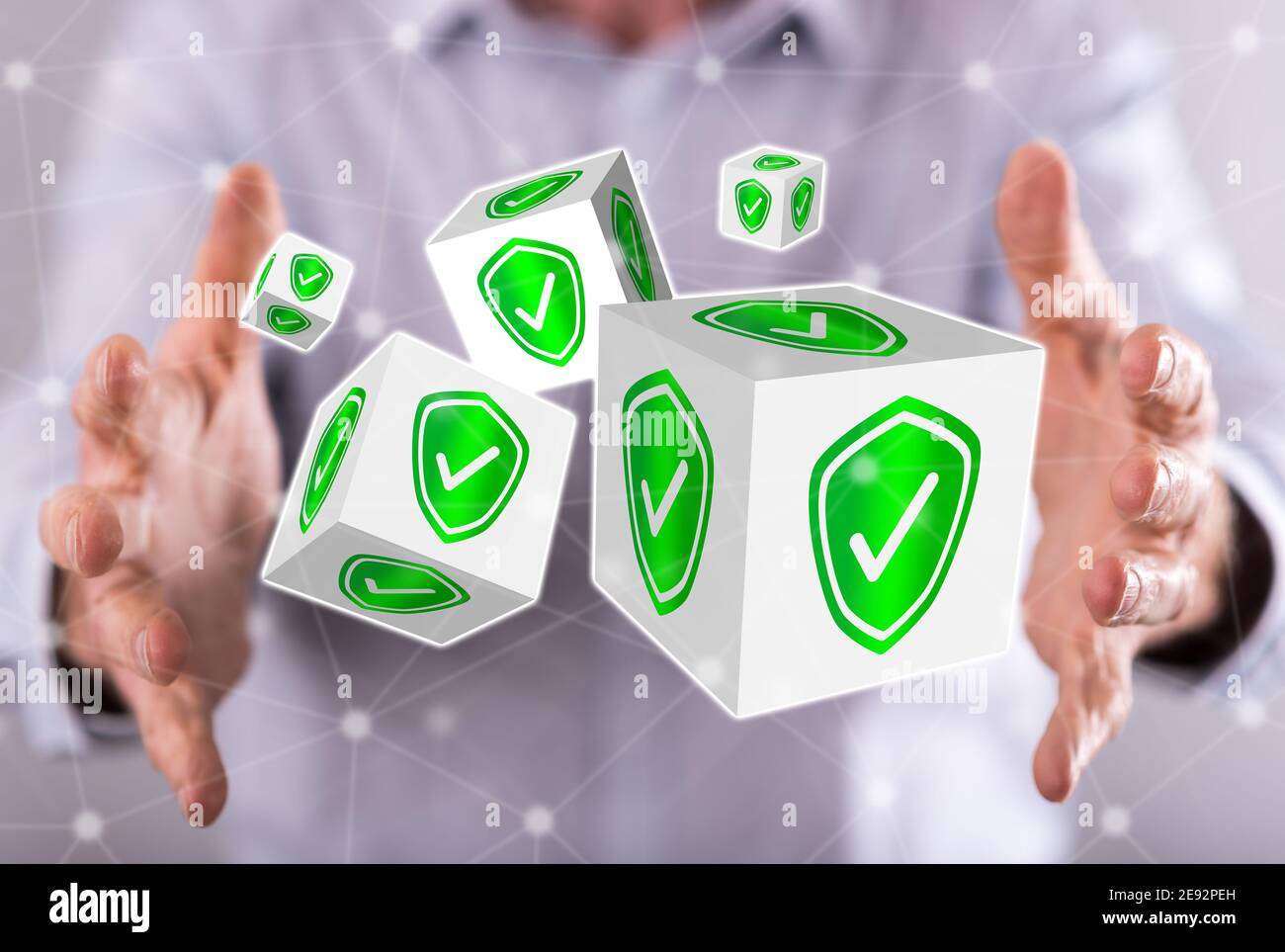 Validation concept between hands of a man in background Stock Photo - Alamy