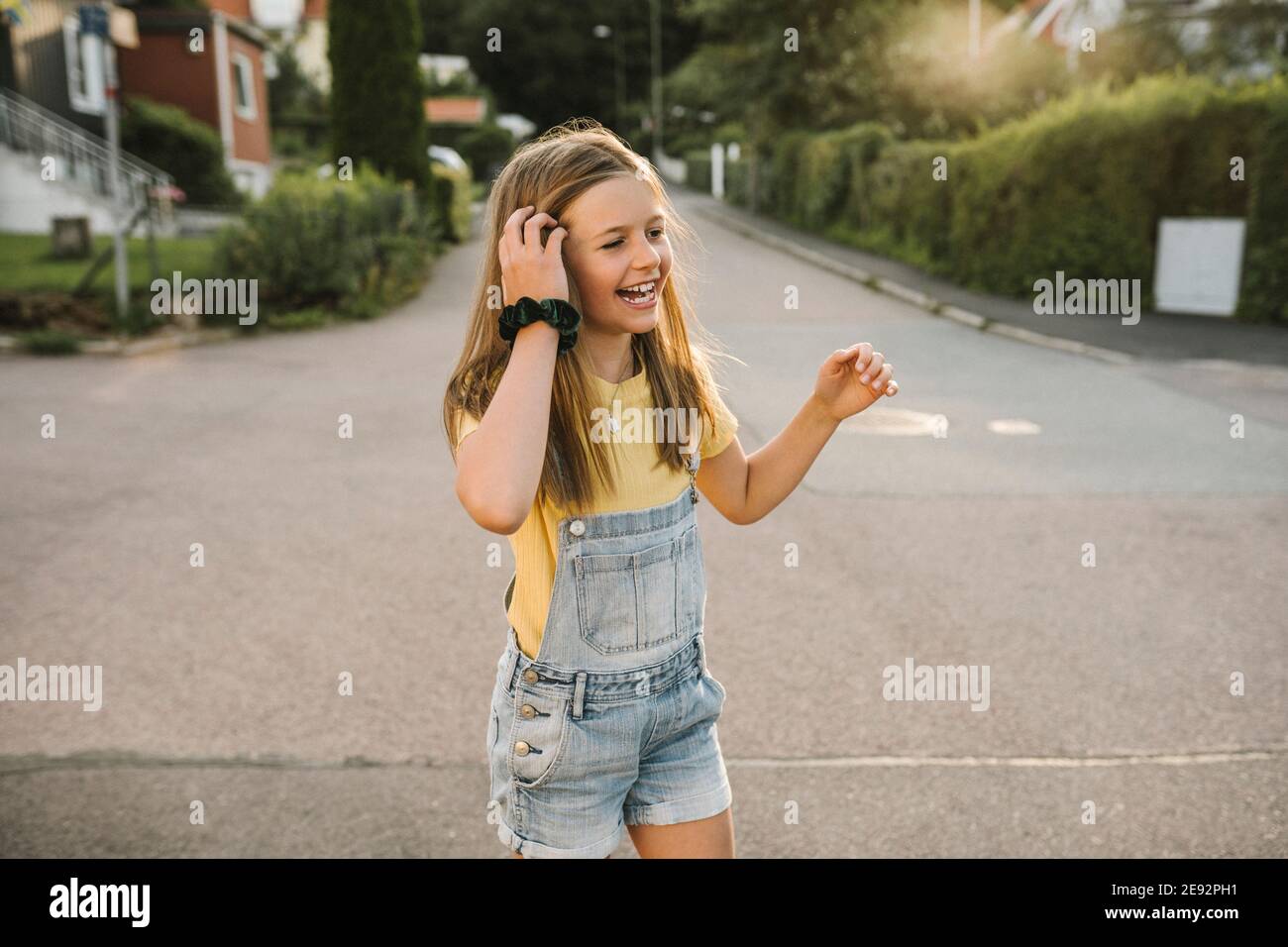 Girl standing on road hi-res stock photography and images - Alamy