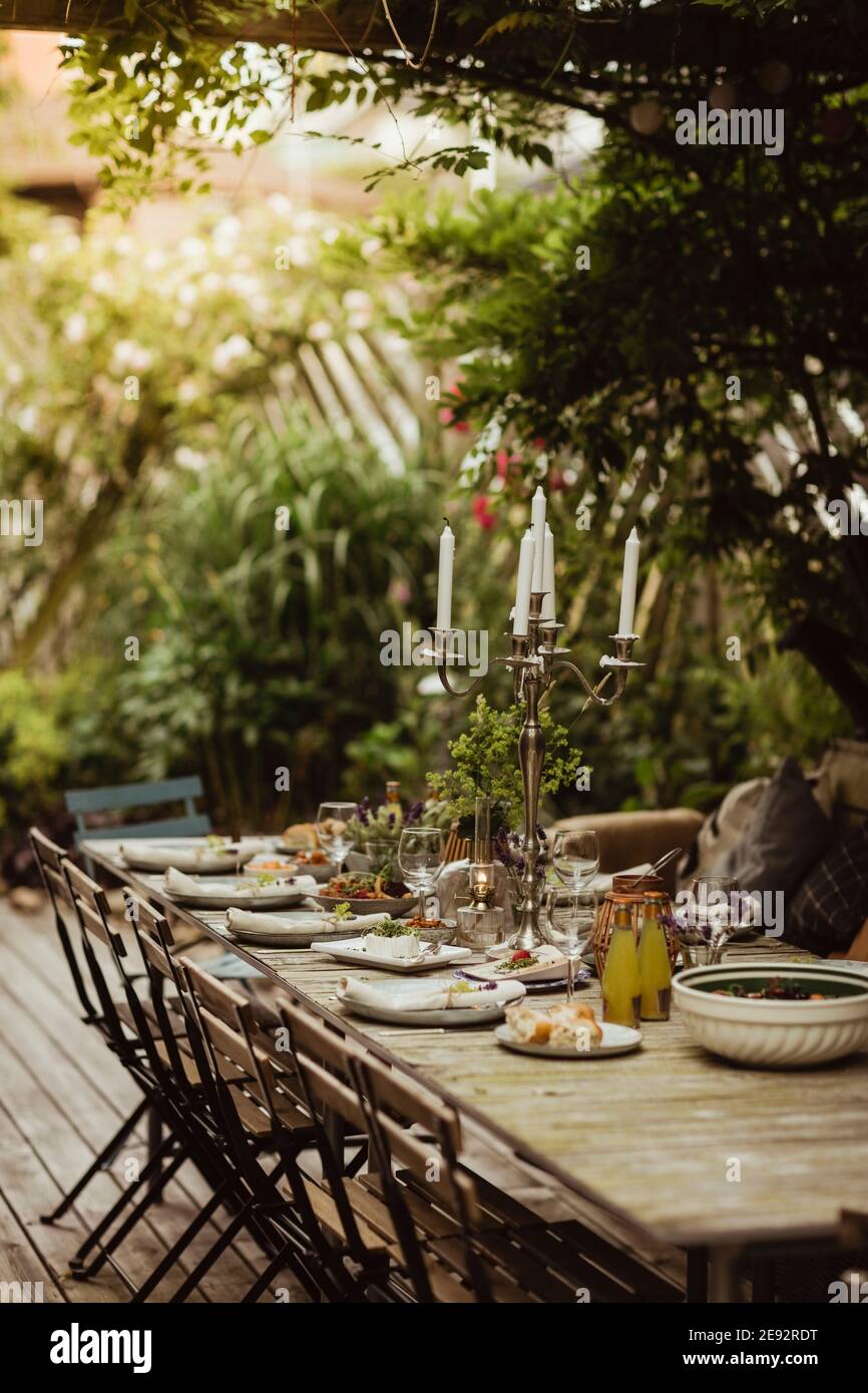Dining table setting for social event Stock Photo - Alamy