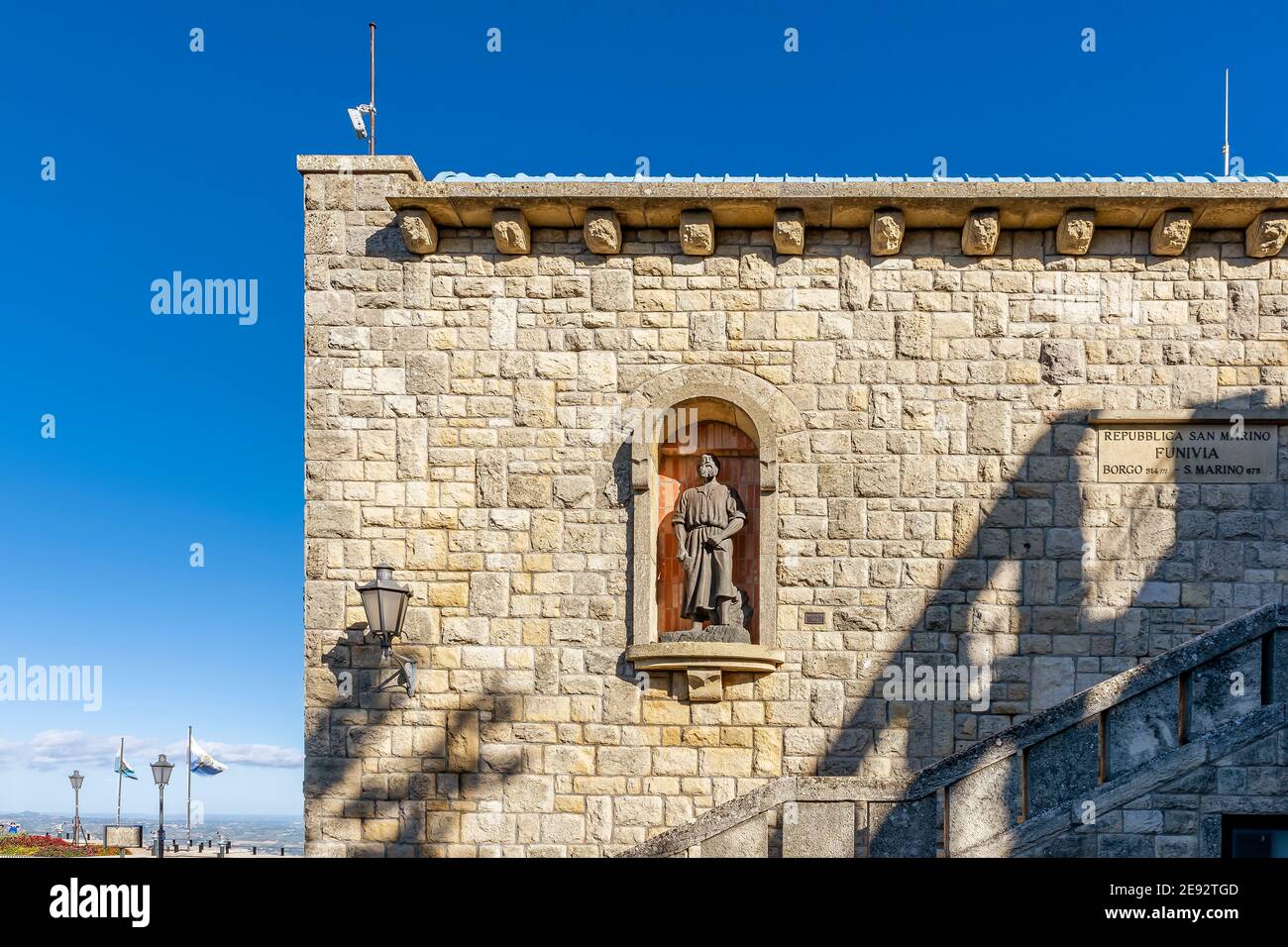 The facade of the ancient building from which the cable car departs and ...