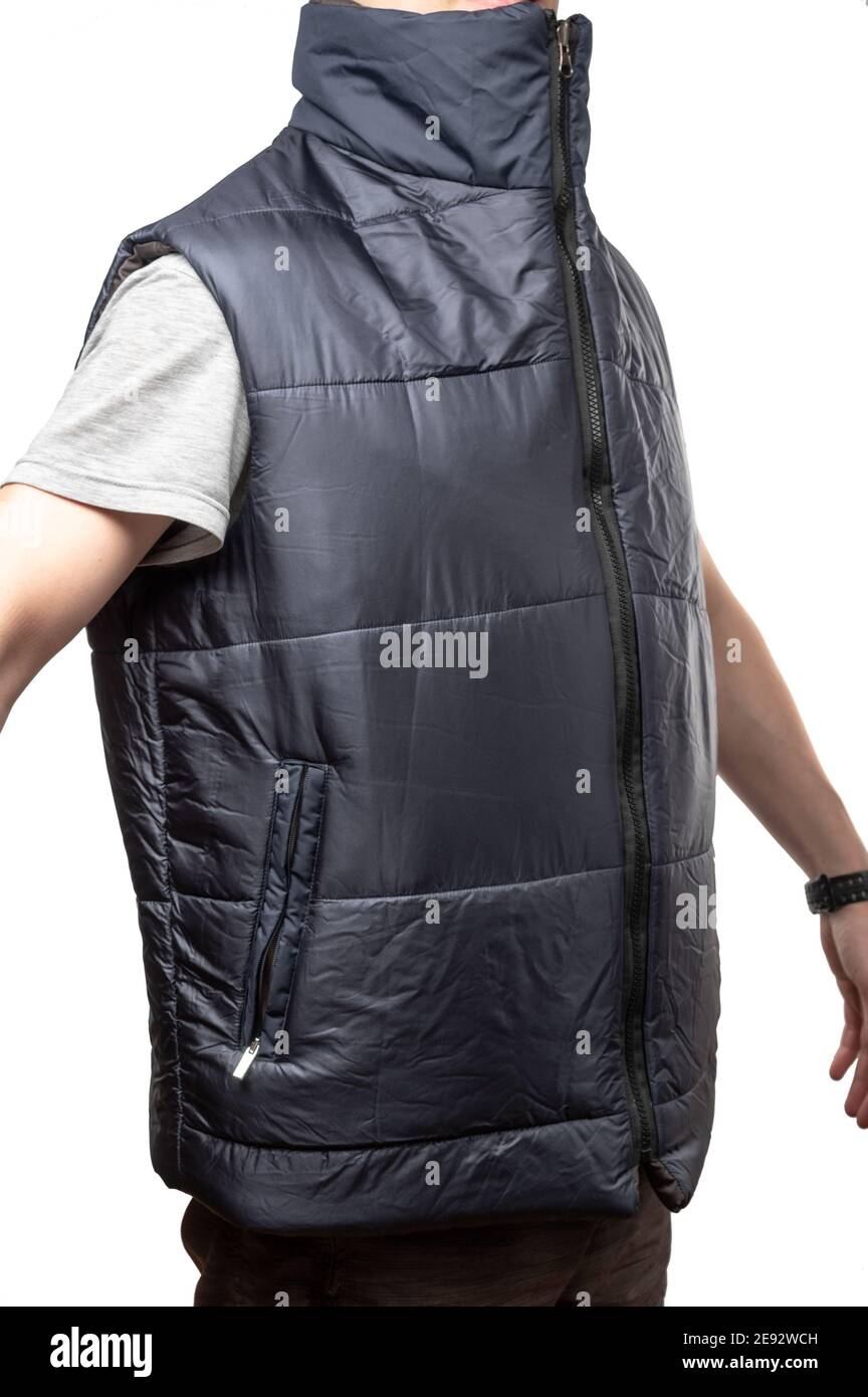 Sleeveless jacket on model. Photo of a model without a head. Vertical ...