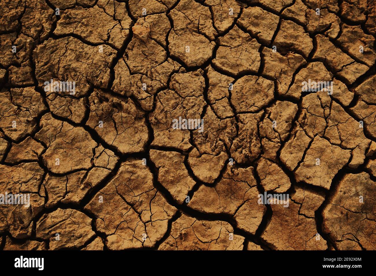 Soil cracked background Stock Photo - Alamy
