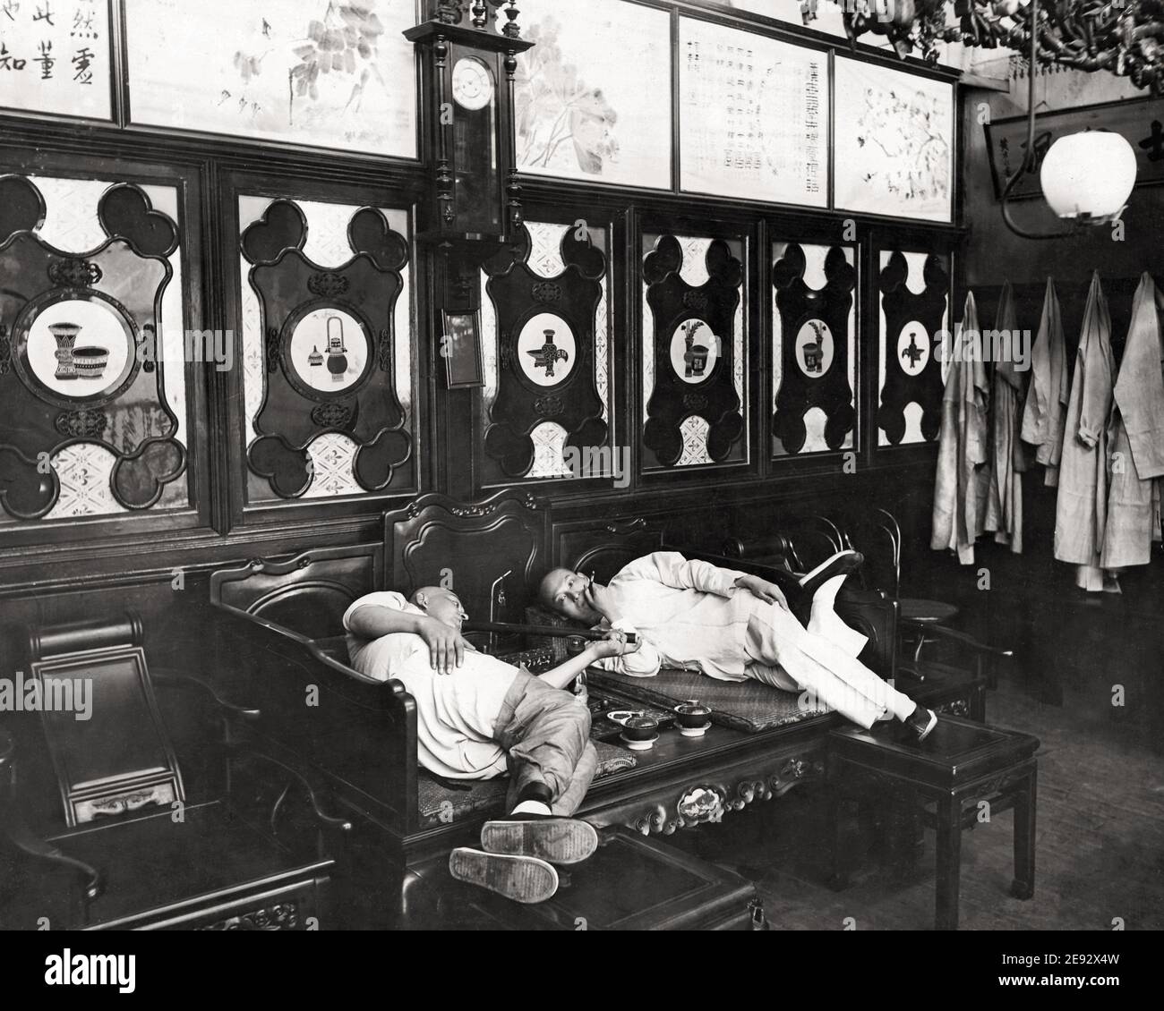 Late 19th century photograph - men smoking opium pipes, China Stock ...