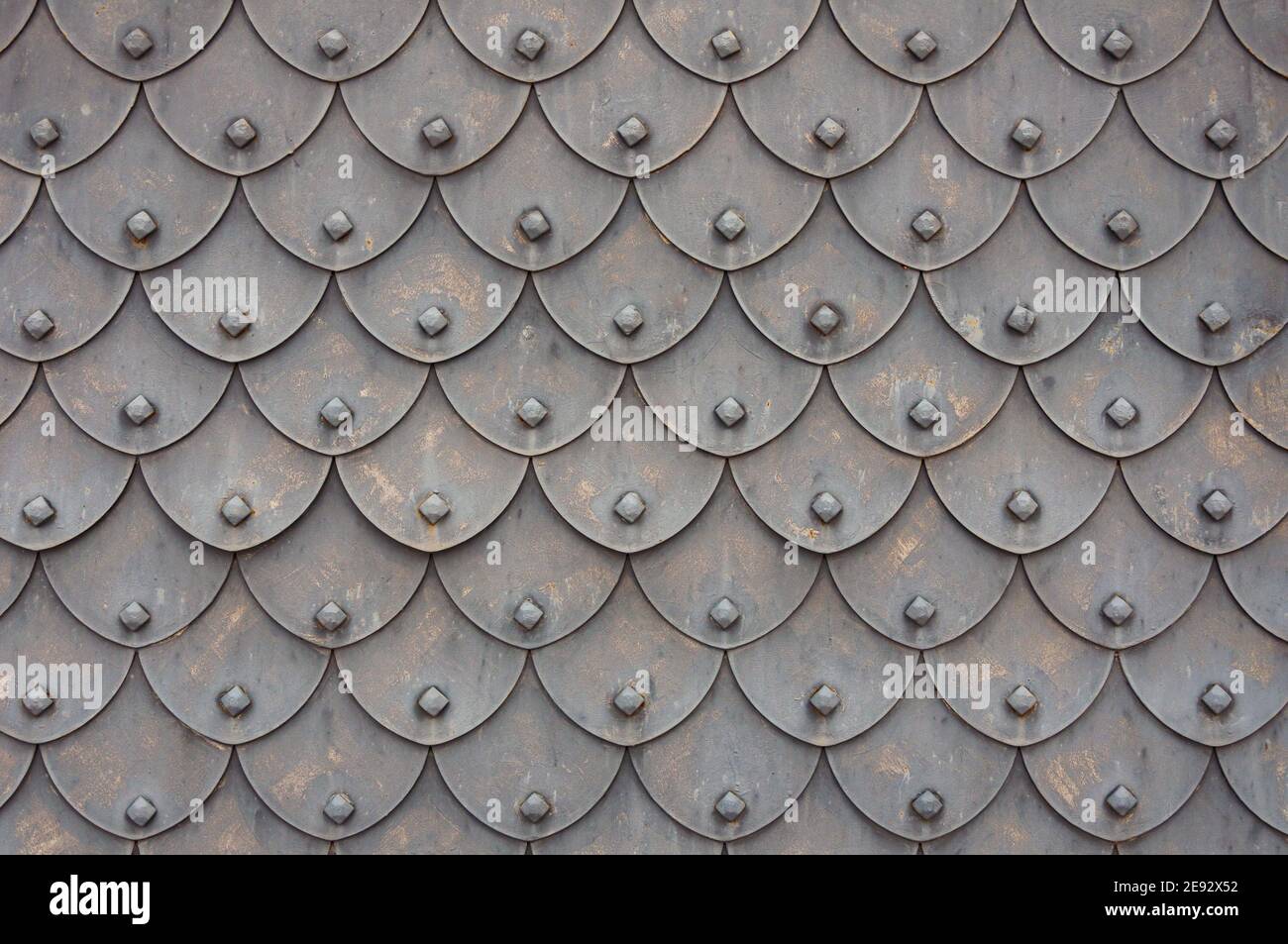 Medieval rusty metal grey scales armor background. Template for border ...