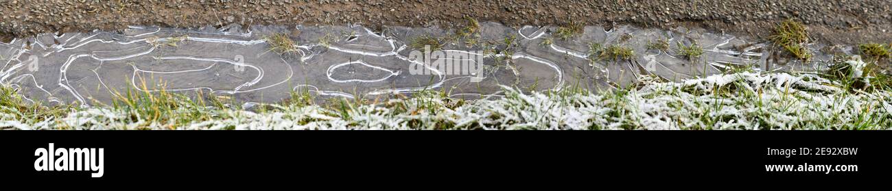 Frozen puddle on a frosty morning Stock Photo - Alamy