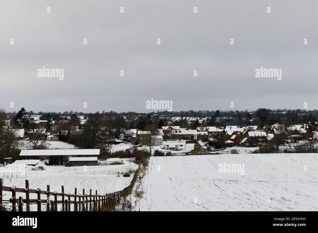 Hook Norton Village with Snowfall Stock Photo - Alamy
