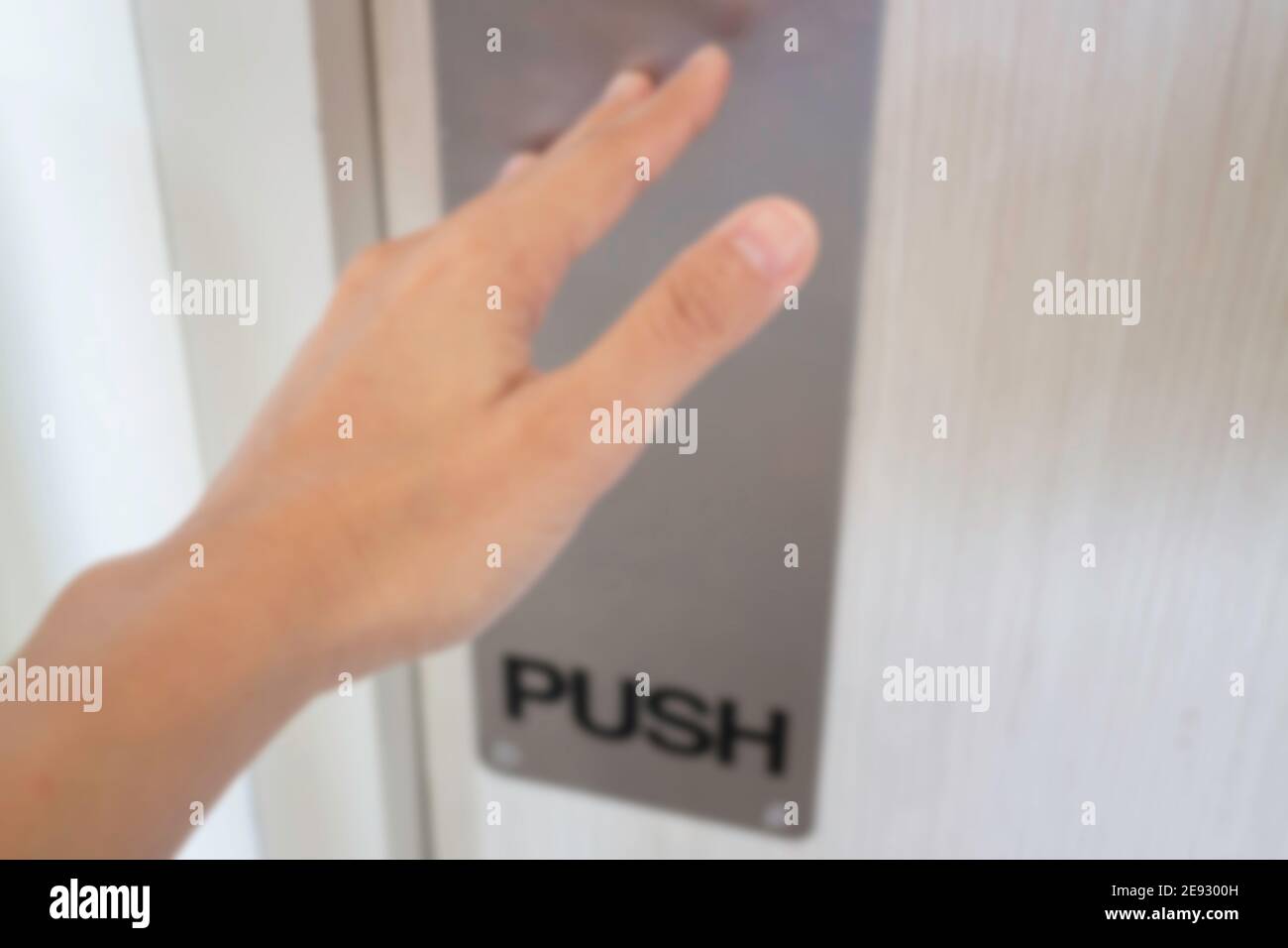 Woman hand pushing the door, stock photo Stock Photo - Alamy