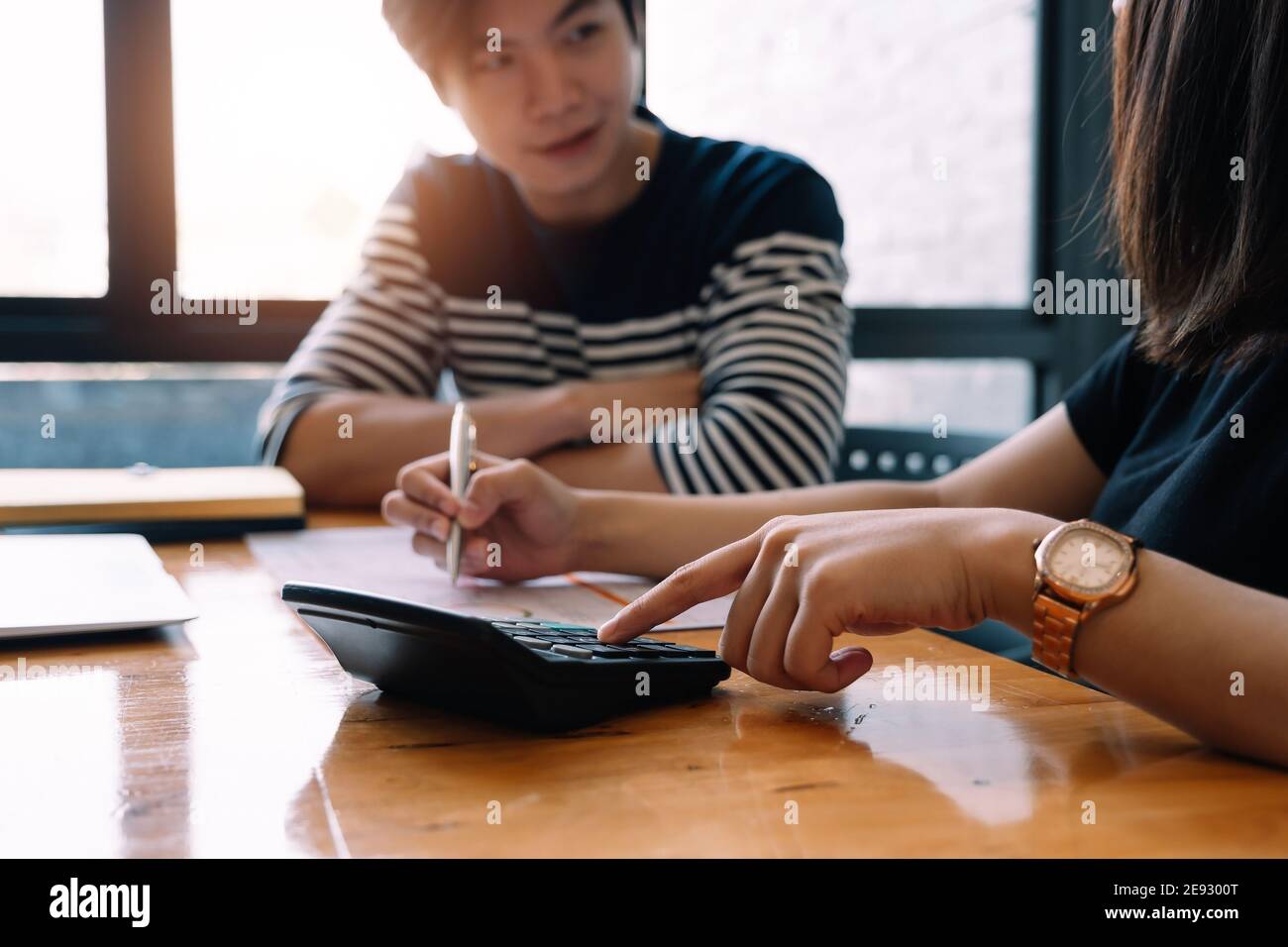 Calculating profits calculator hi-res stock photography and images - Alamy