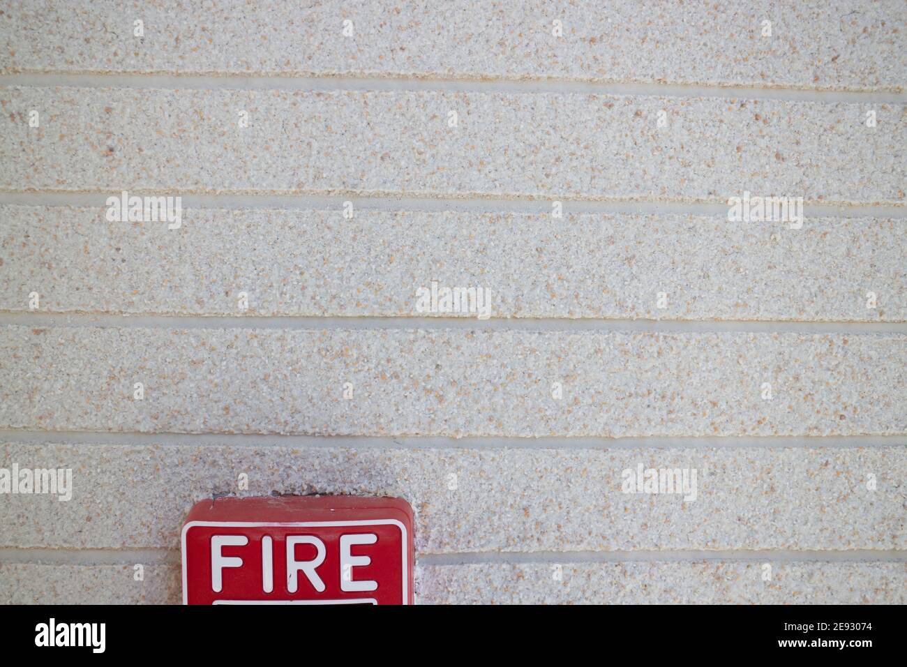 Fire alarm button red square box style attached to the wall, stock ...