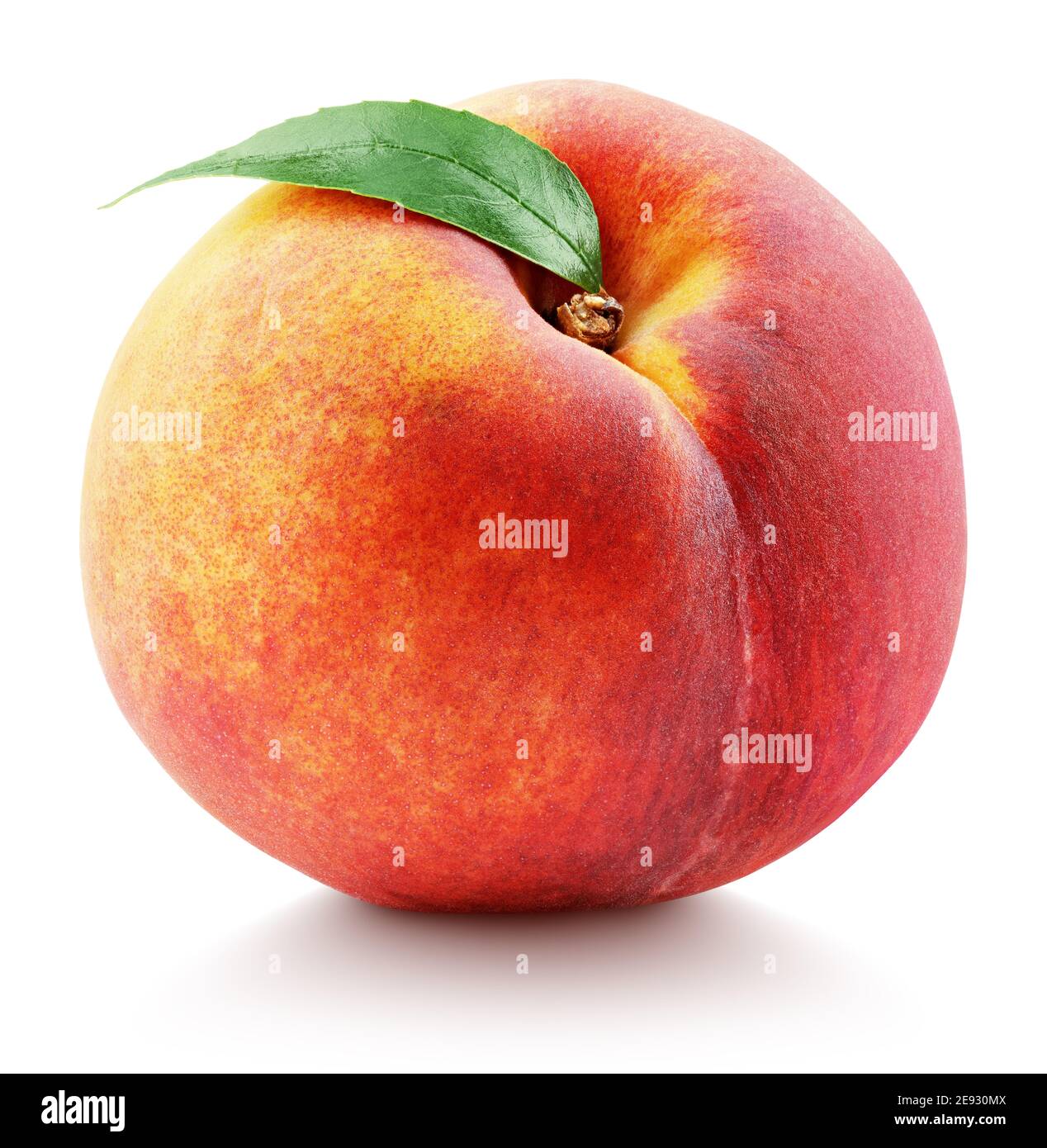 Ripe whole peach fruit with green leaf isolated on white background ...