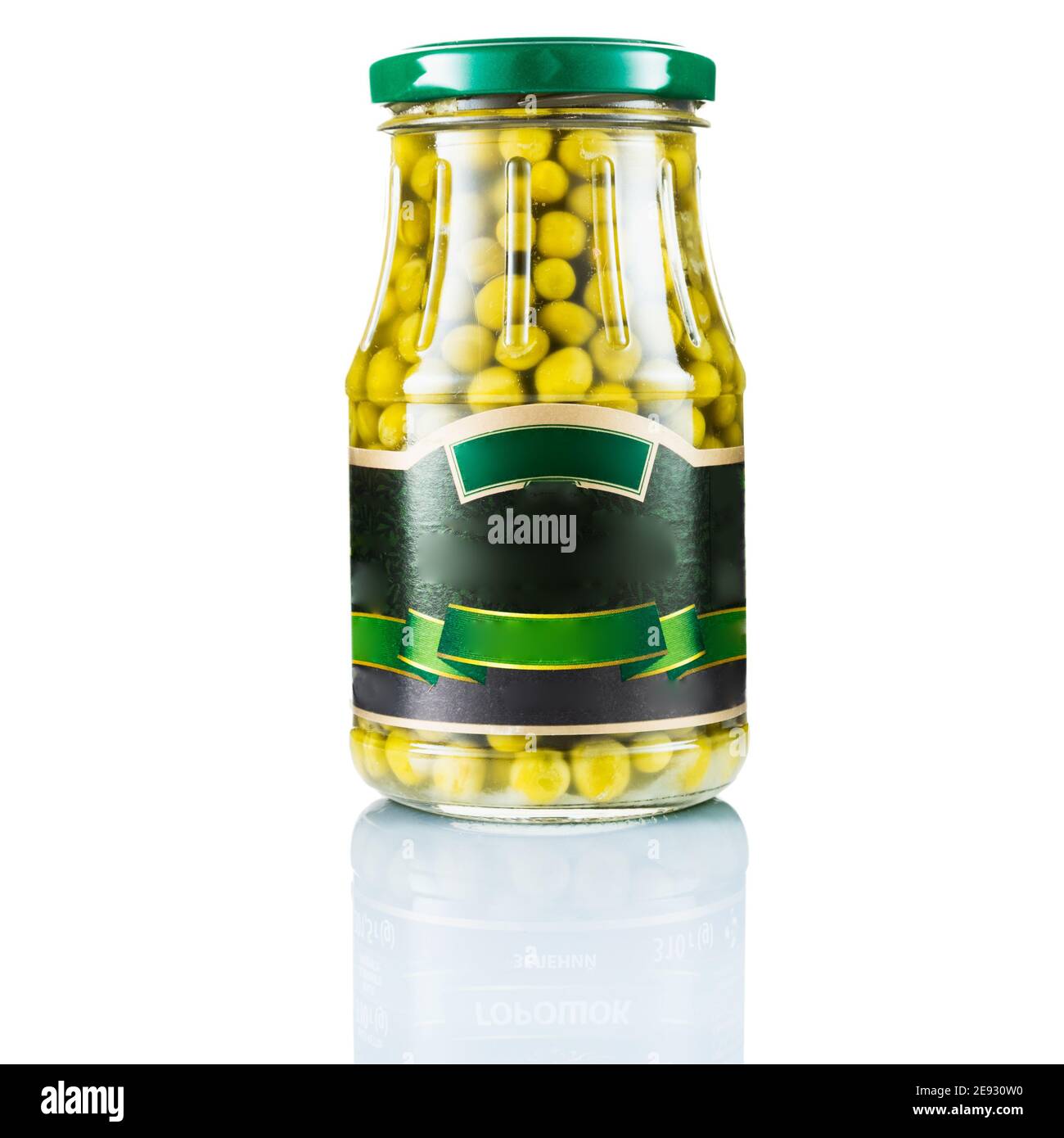 Green peas in a glass jar. Tinned green peas. Glass isolate. Vertical ...