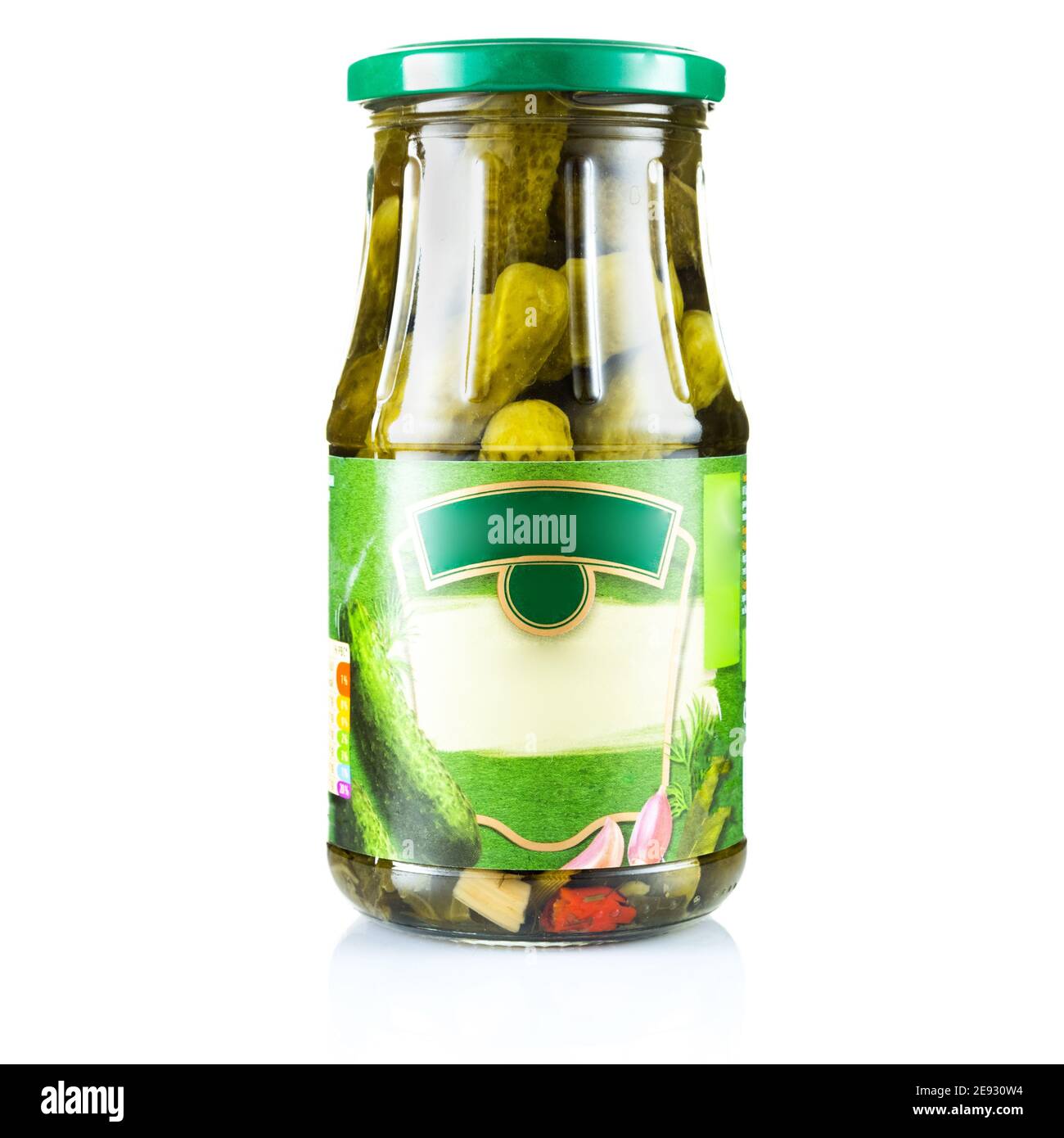 Pickled cucumbers in a glass jar. Canned cucumbers. Vegetables in a jar ...