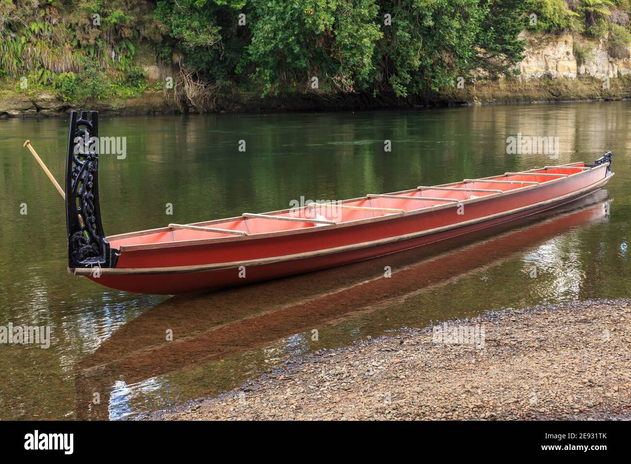 A Maori waka (a traditional canoe with ornamental carvings) on the ...