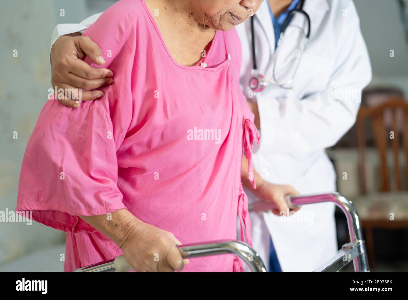 Asian senior or elderly old lady woman patient walk with walker at ...