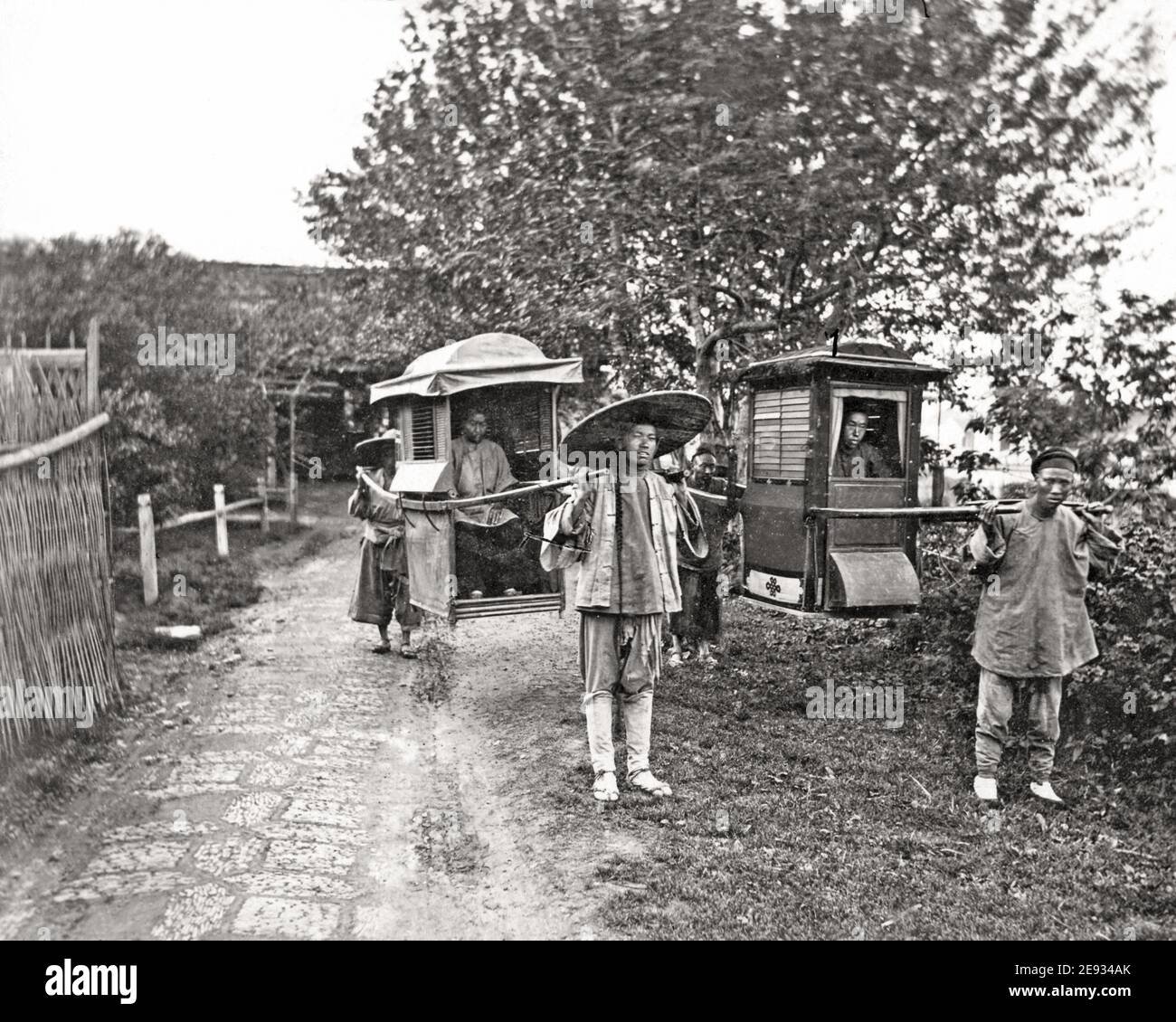 Late 19th century photograph - men in carrying chairs, sedan chairs ...