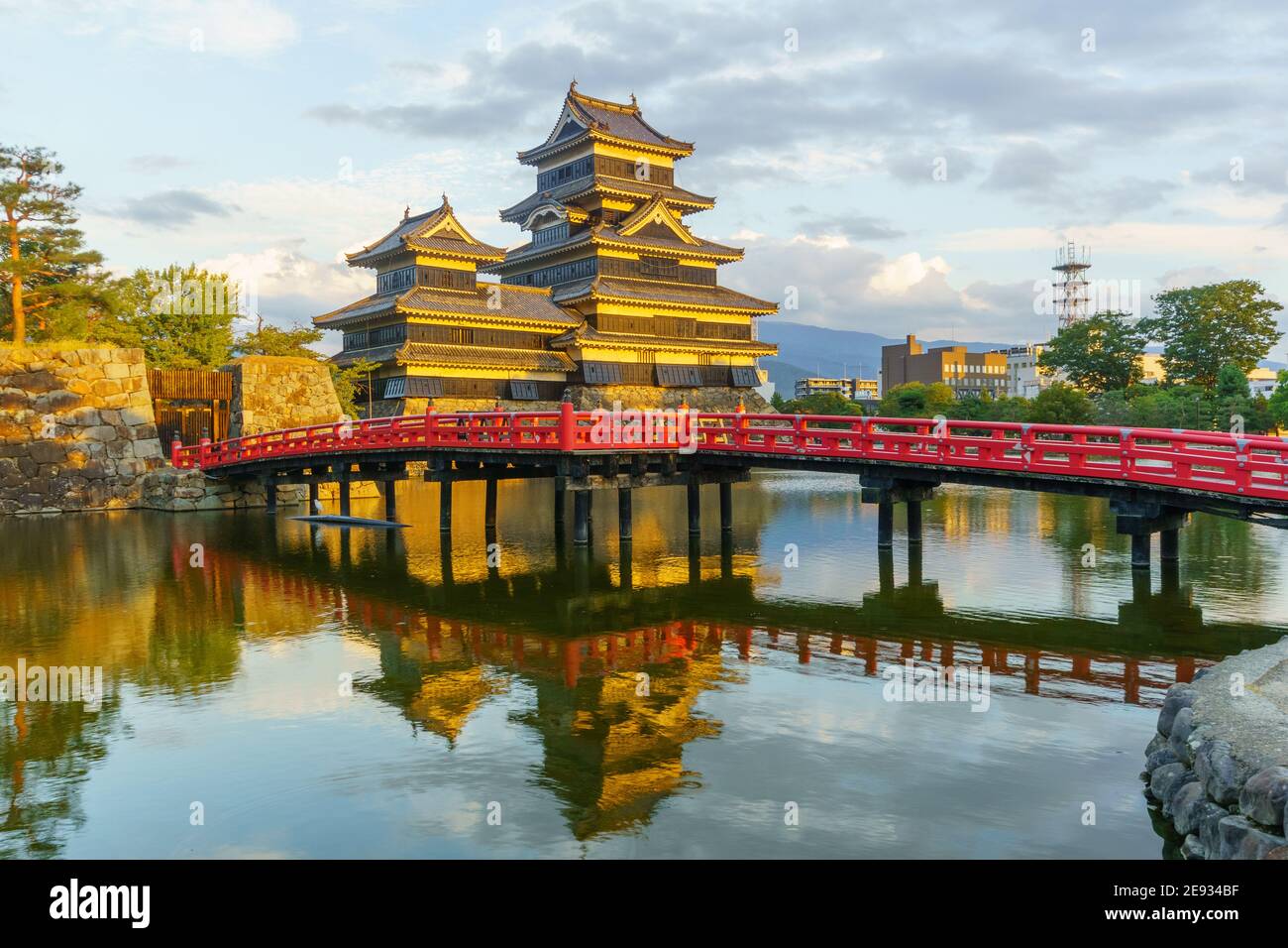 Sunset view of the Matsumoto Castle (or Crow Castle) and bridge, in ...