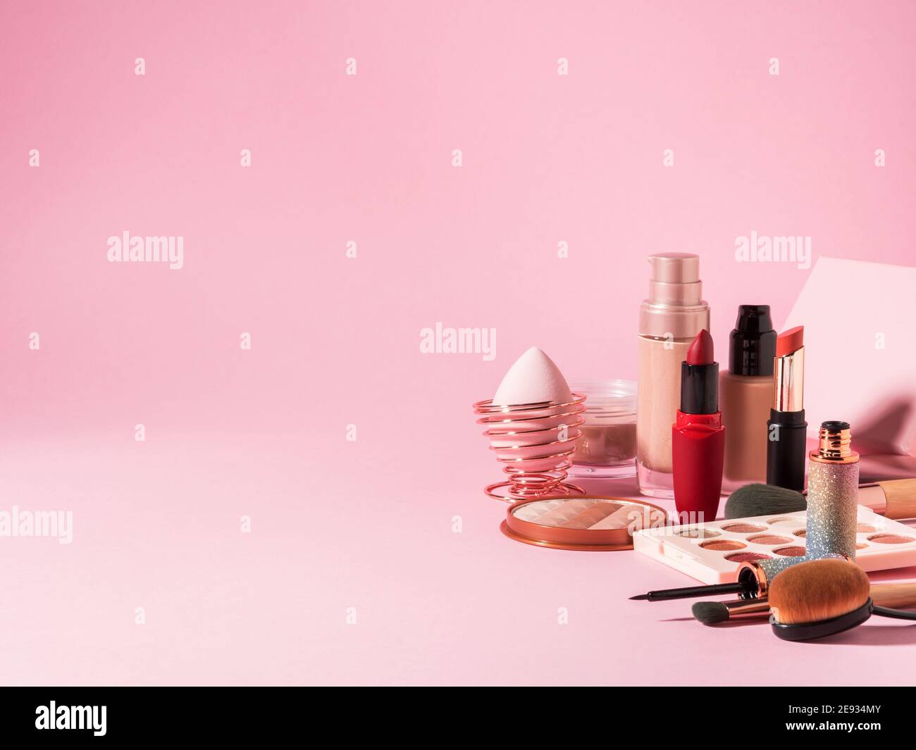 Cosmetics beauty products background with on pink Stock Photo - Alamy