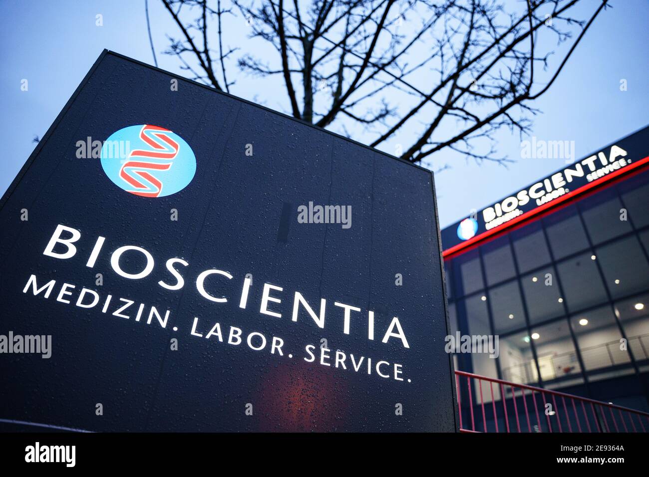 Ingelheim, Germany. 01st Feb, 2021. An illuminated company sign stands ...
