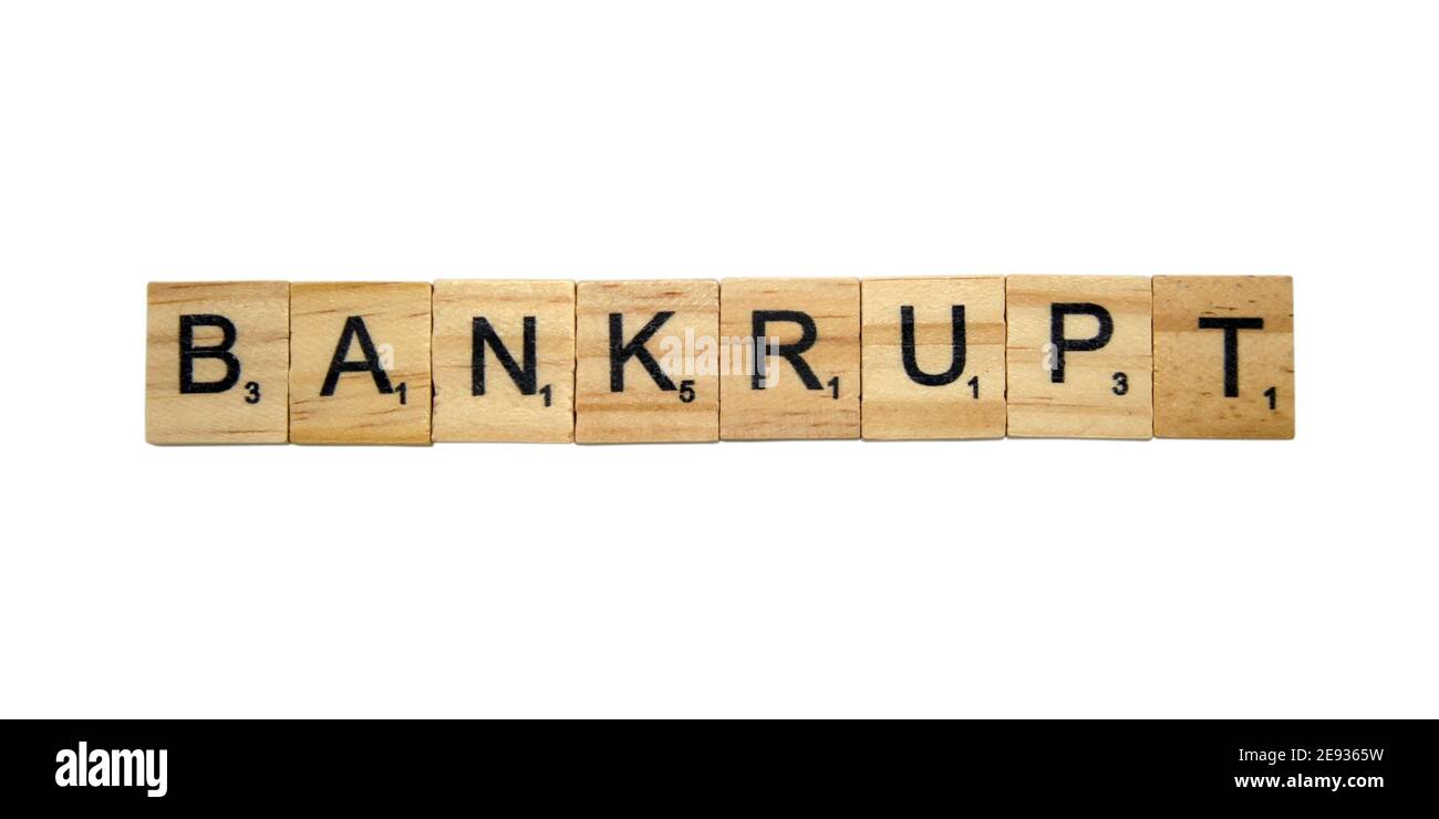Scrable letters. Word game with wooden letters. Bankruptcy word Stock ...