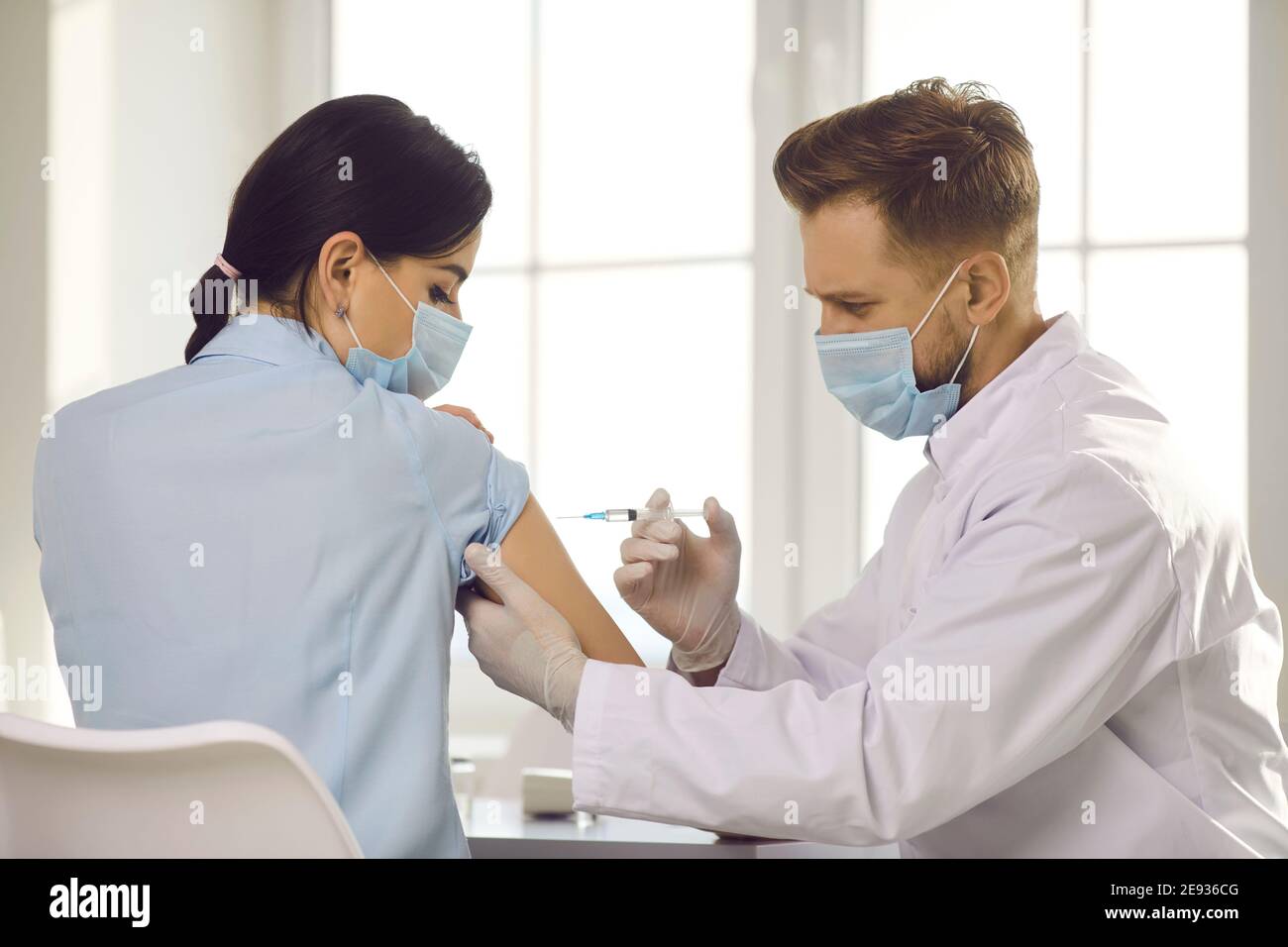 Doctor patient vaccination arm hi-res stock photography and images - Alamy