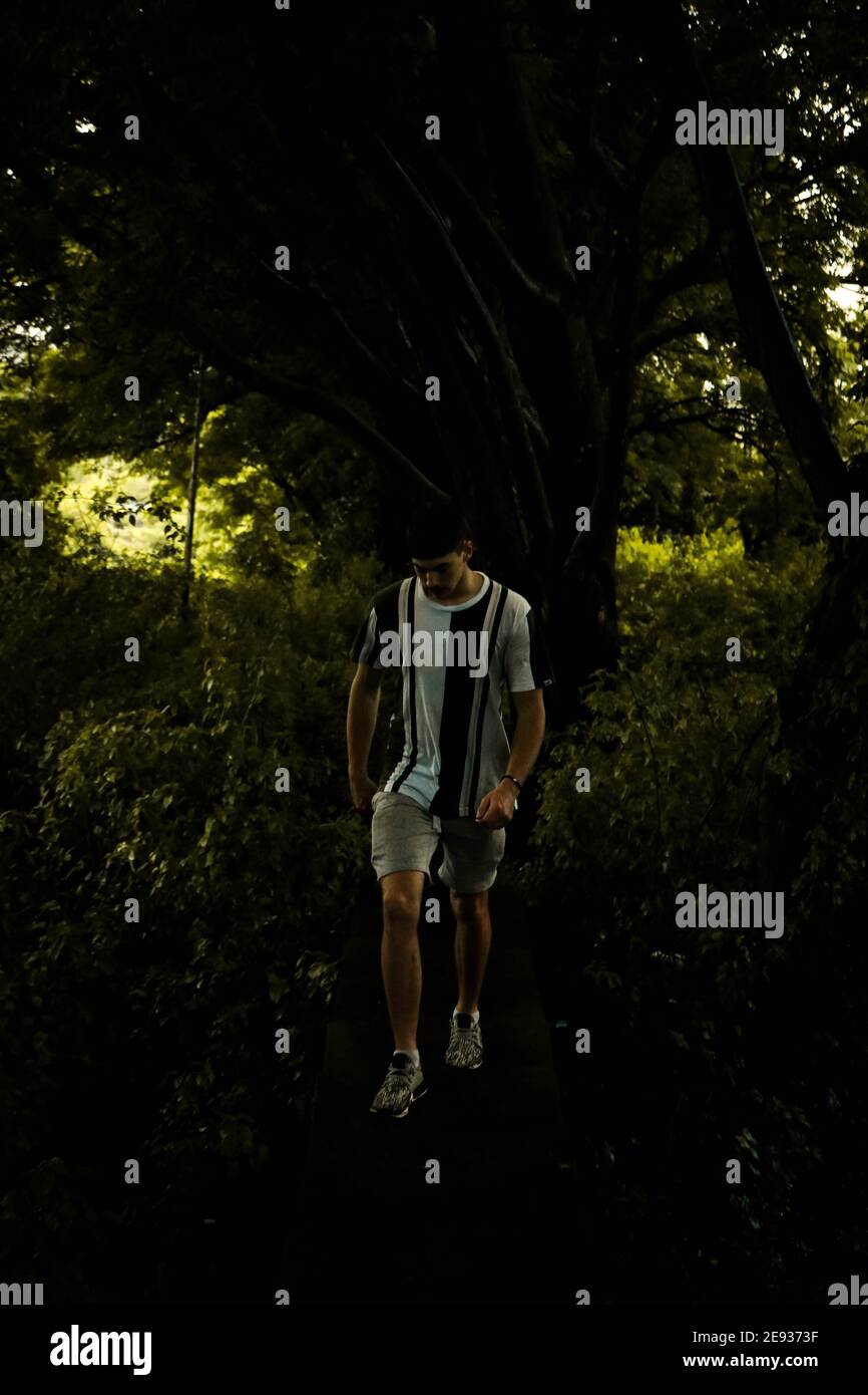 Photo of a man in the jungle Stock Photo - Alamy