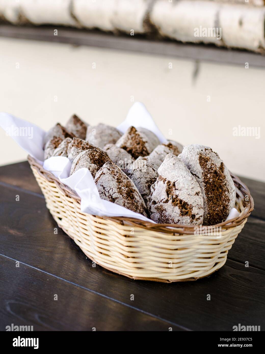Small rye bread loafs in a basket at a restaurant Stock Photo - Alamy