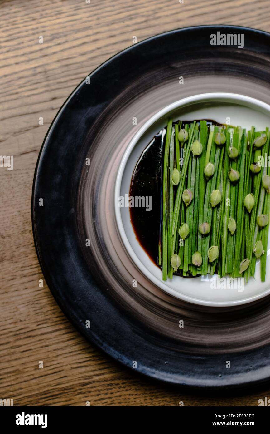 Beautiful dish of garden greens in soy sauce at a restaurant Stock ...
