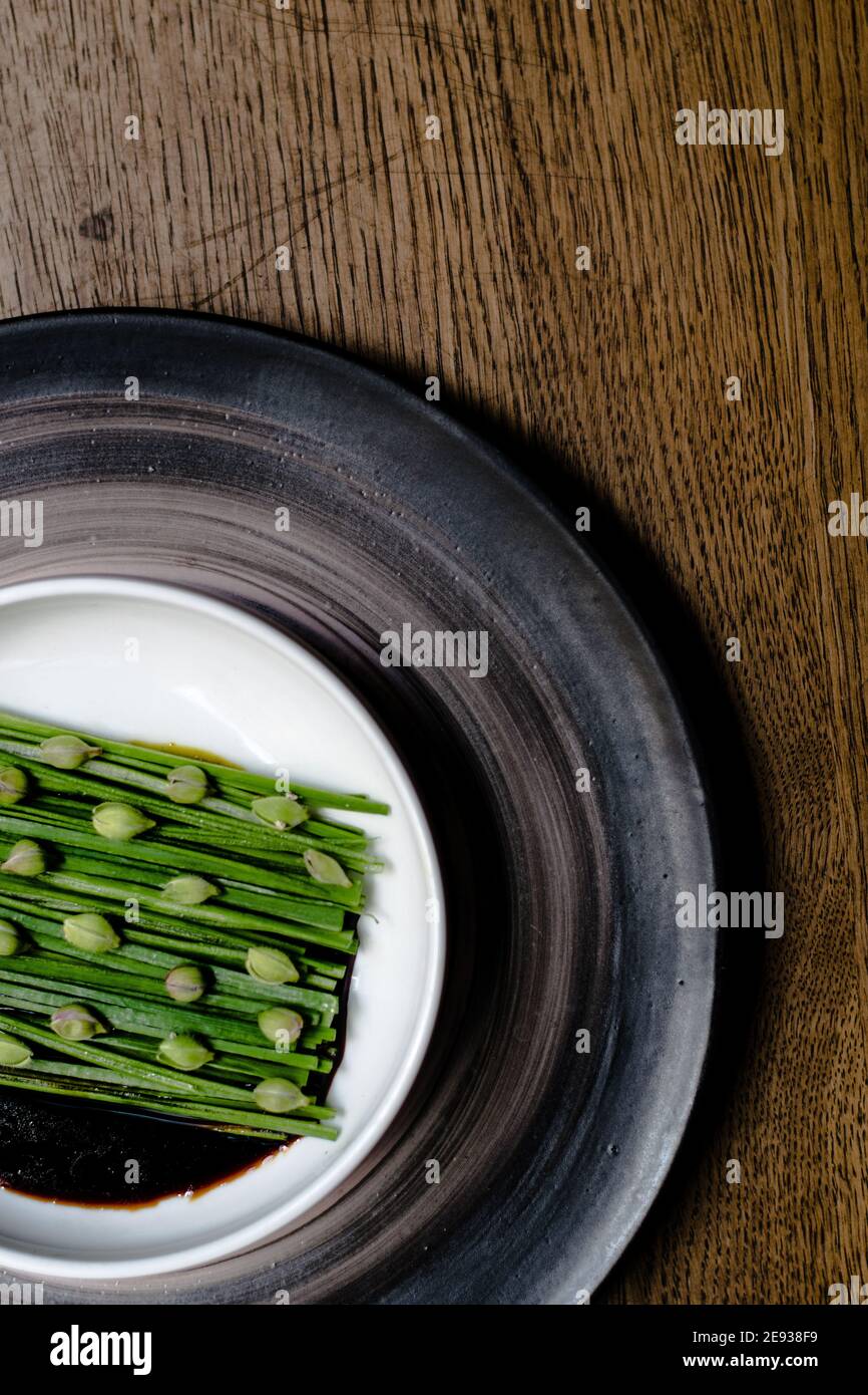 Beautiful dish of garden greens in soy sauce at a restaurant Stock ...