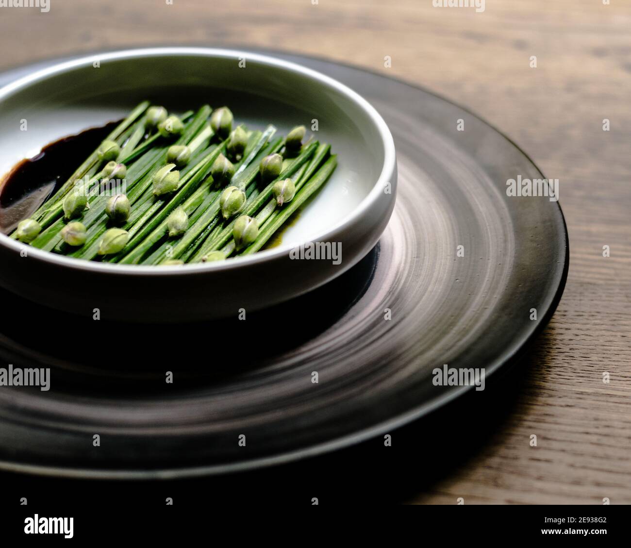 Beautiful dish of garden greens in soy sauce at a restaurant Stock ...