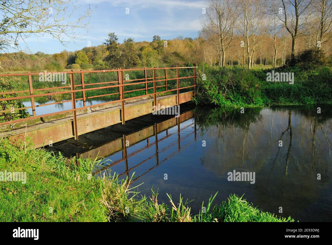 A footbridge over a side channel of the river Avon in south Wiltshire ...
