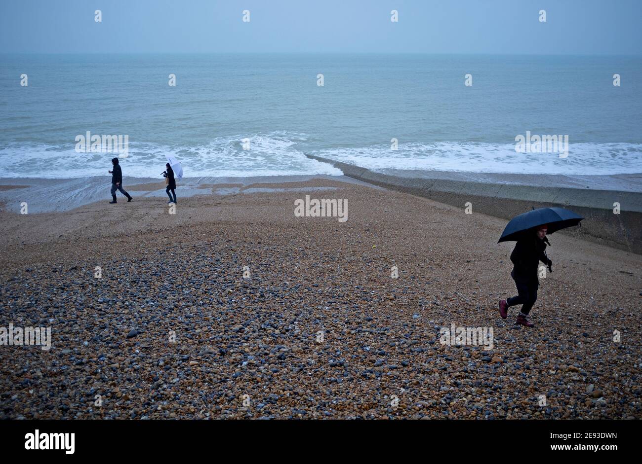 A wet winter's day on the beach at Brighton Stock Photo - Alamy